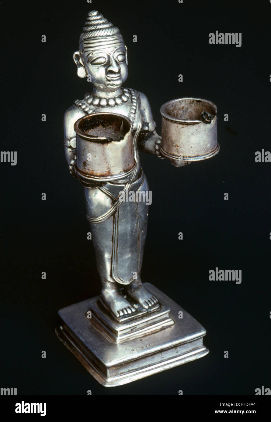 INDIAN CEREMONIAL FIGURE. /nSilver lamp in the shape of a man making an ...