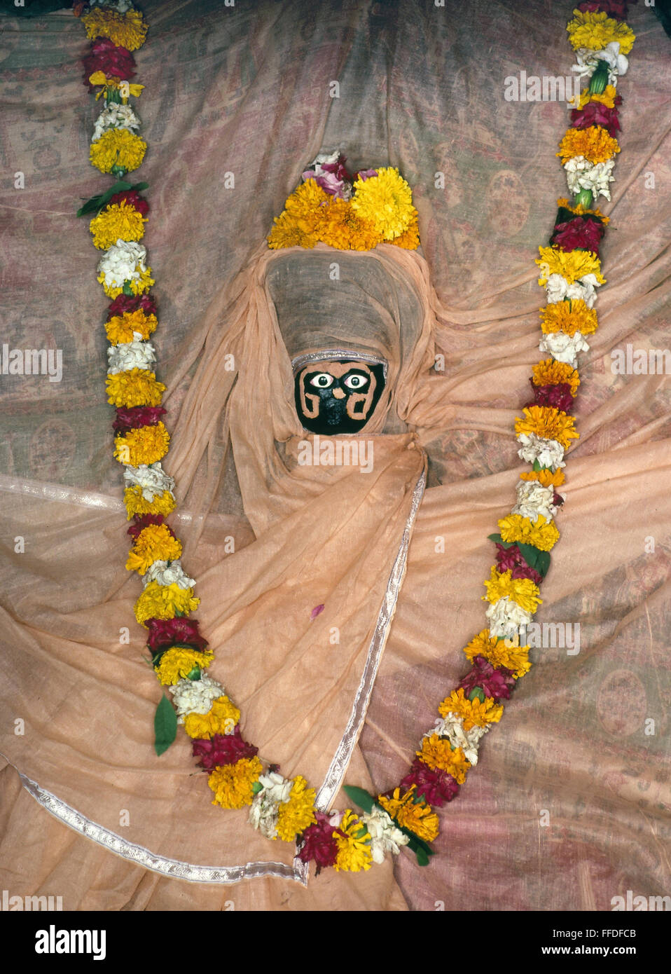 INDIA: EKLINGJI TEMPLE. /nStatue of a Hindu god, draped in silk and ...