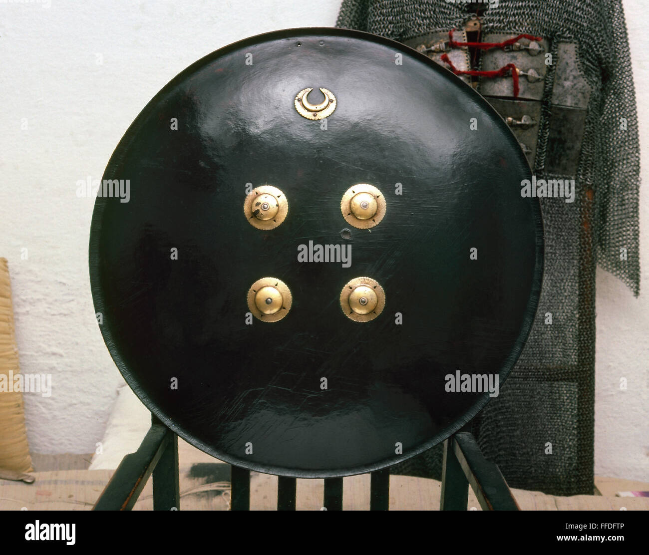 INDIAN SHIELD. /nIndian shield with brass bosses Stock Photo - Alamy