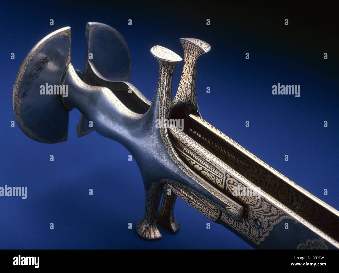 INDIAN SWORD HILT. /nIndian sword hilt with gold decoration Stock Photo ...