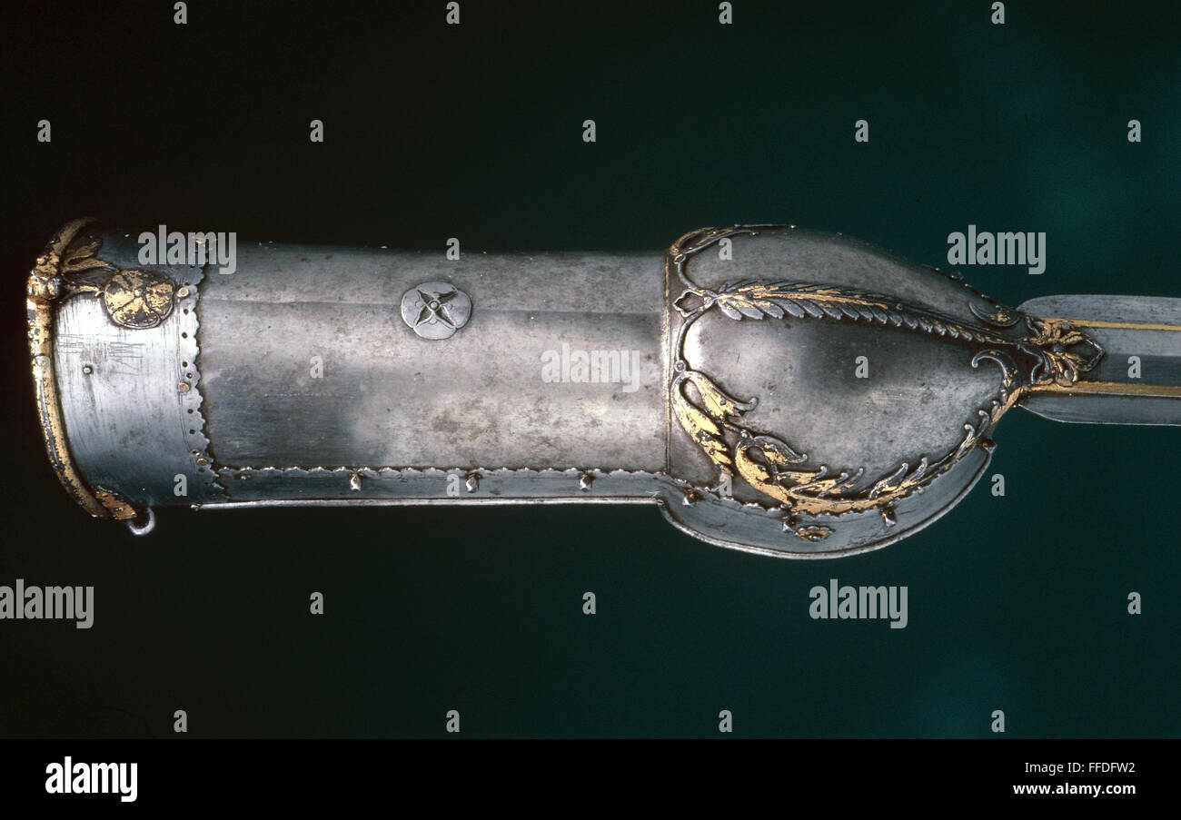INDIAN SWORD HILT. /nIndian sword hilt with floral decoration Stock ...