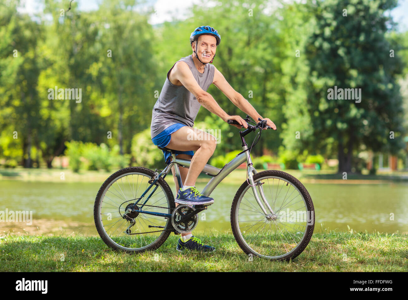 Man on bike park hi-res stock photography and images - Alamy