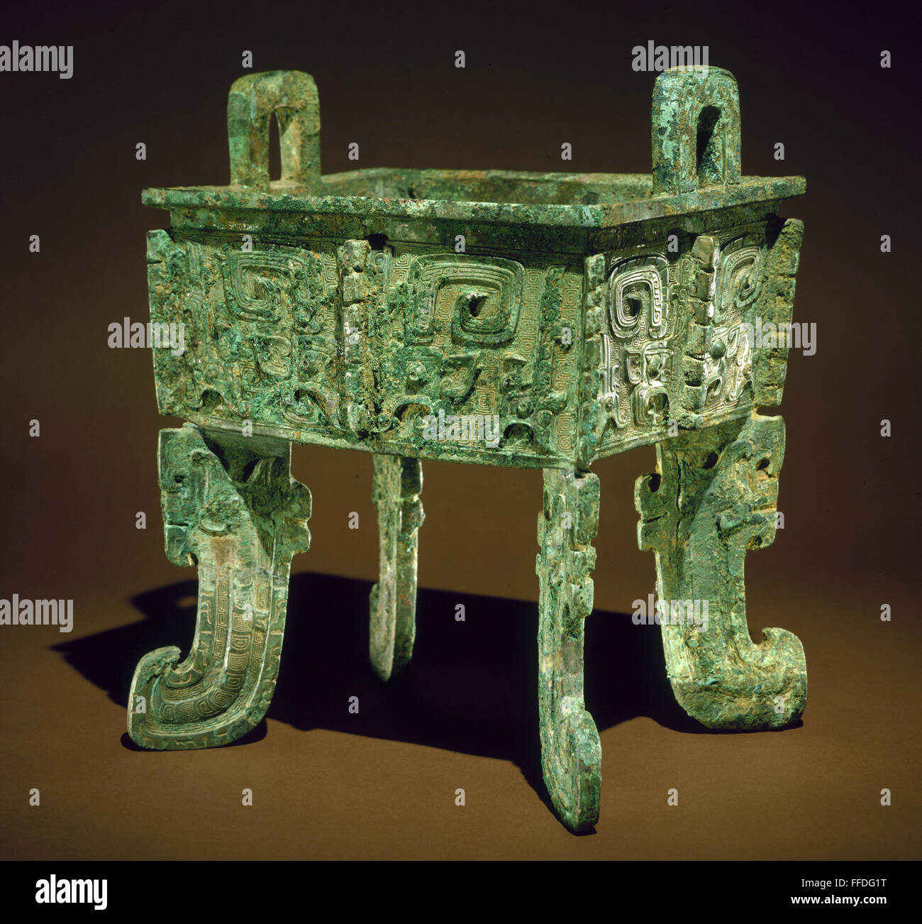 CHINA: BRONZE BASIN. /nBronze 'fang ding' vessel. Anyang period, c1300 ...