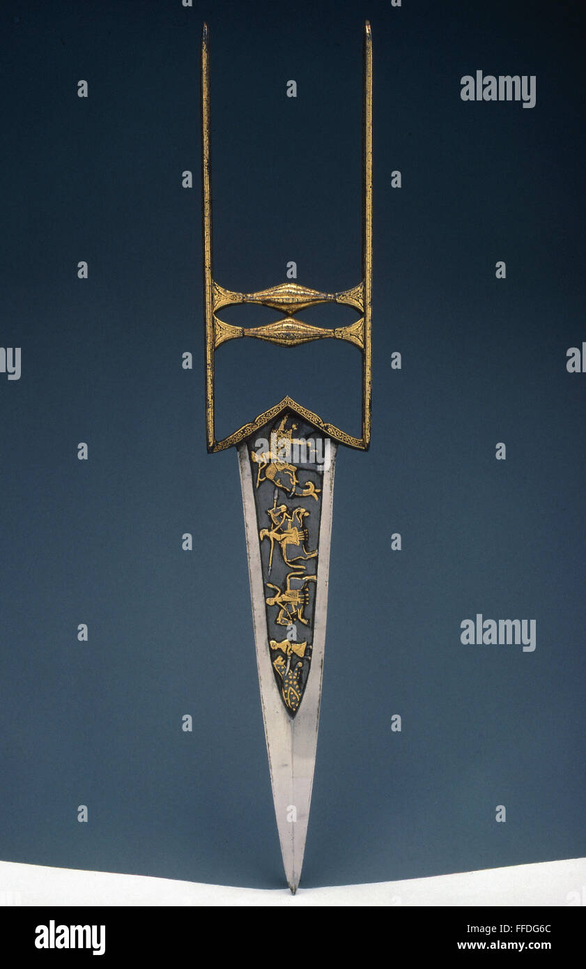 INDIAN DAGGER. /nA 'qatar,' an Indian dagger with long double handles ...