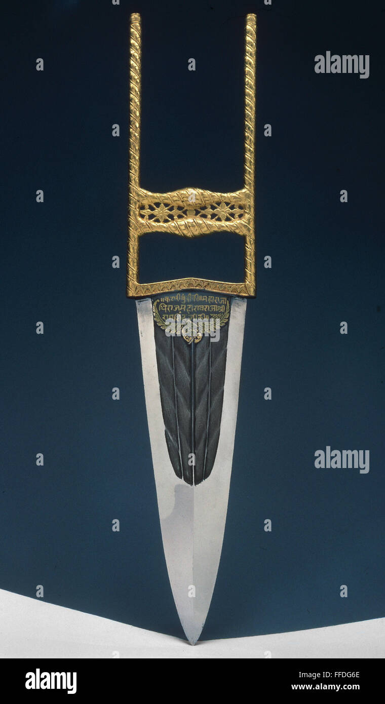 INDIAN DAGGER. /nA 'qatar,' an Indian dagger with long double handles ...