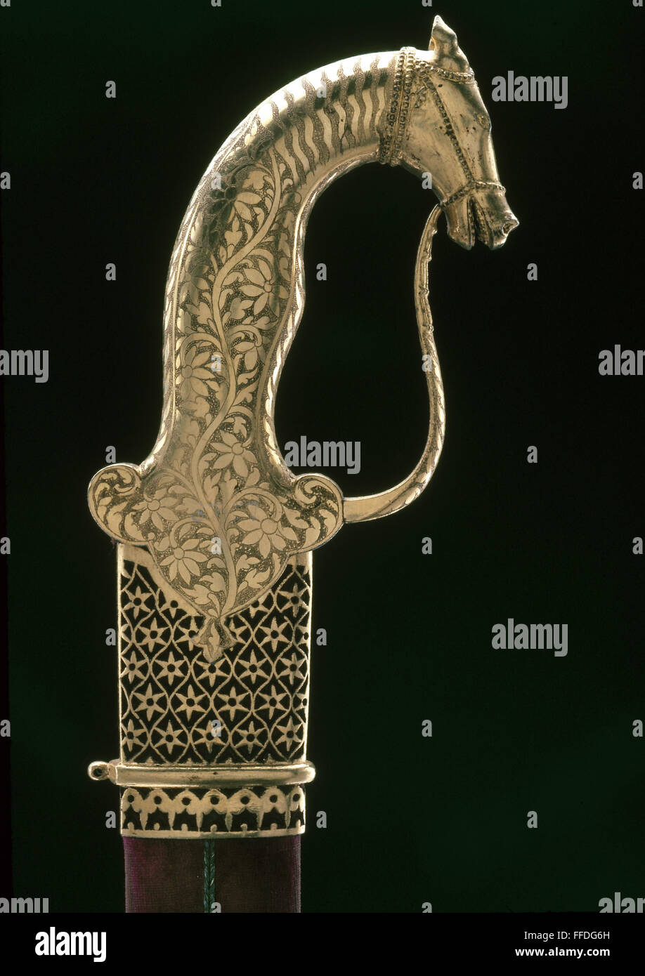 INDIAN SWORD HILT. /nGold plated sword hilt in the shape of a horse ...