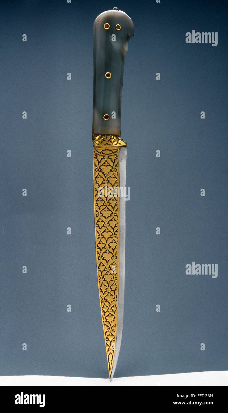 INDIAN DAGGER. /nDecorative dagger with a cut stone handle and gold ...