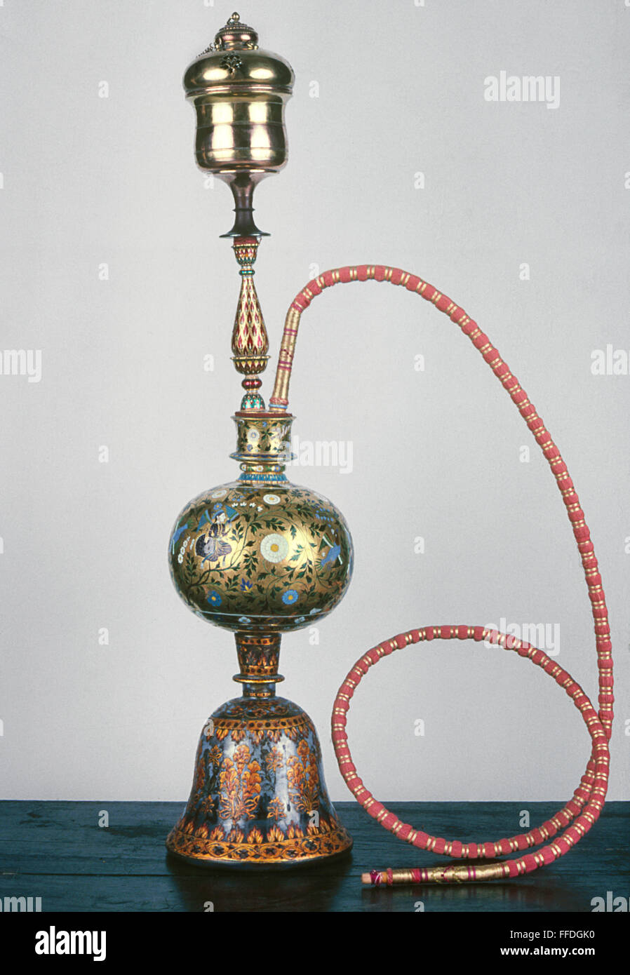 INDIAN HOOKAH. /nHookah made in India, with a painted glass base and a ...