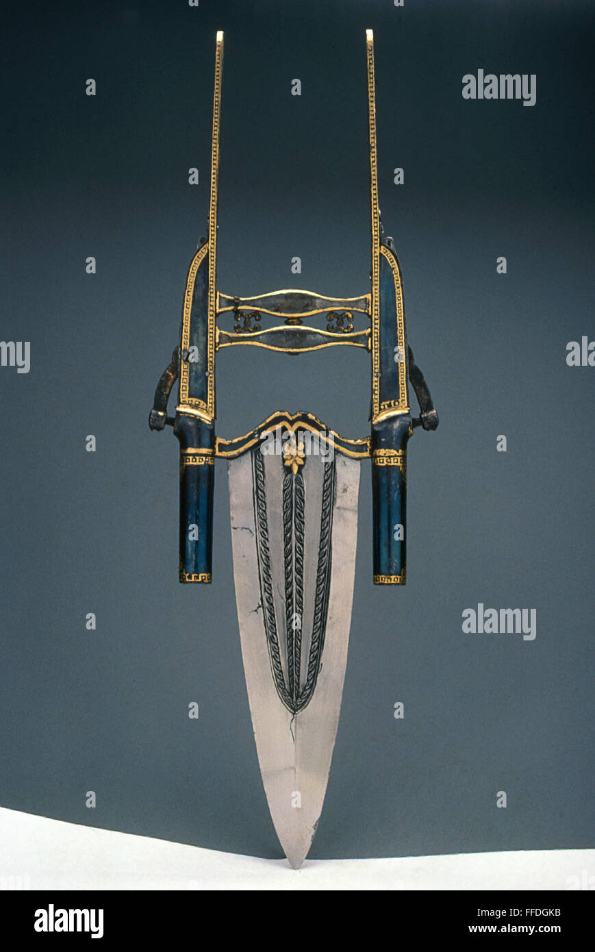 INDIAN DAGGER. /nA 'qatar,' an Indian dagger with long double handles ...