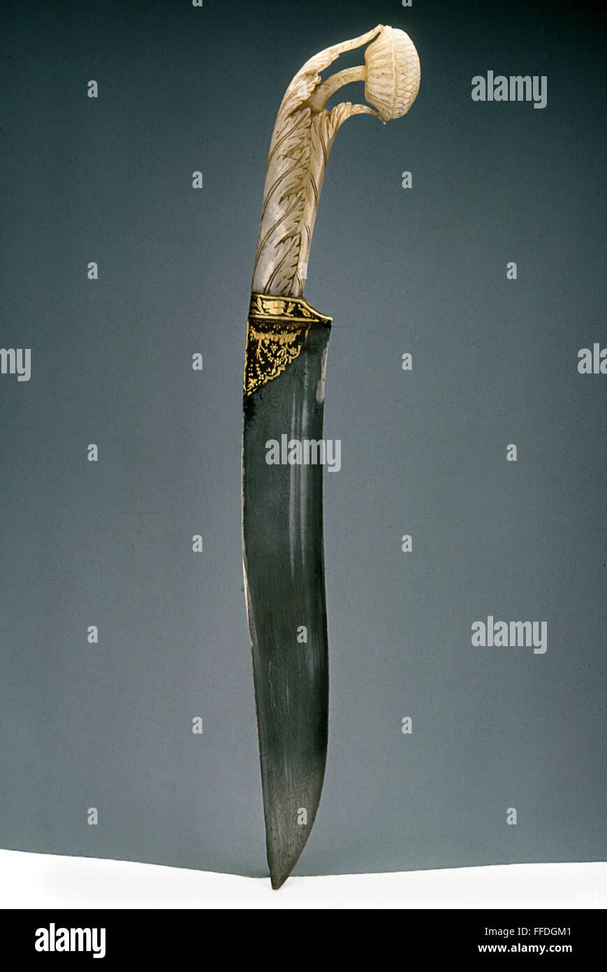 INDIAN DAGGER. /nDagger with a decorated ivory hilt. From the royal ...