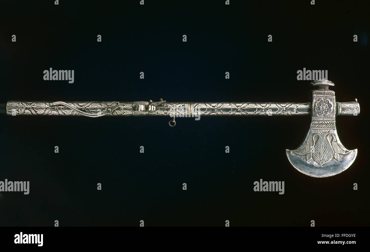 INDIAN BATTLE AX. /nSteel battle-ax which conceals a matchlock gun. The ...