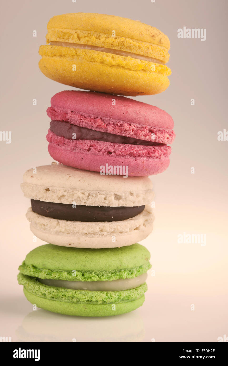 Colorful macarons stack vintage background Stock Photo - Alamy
