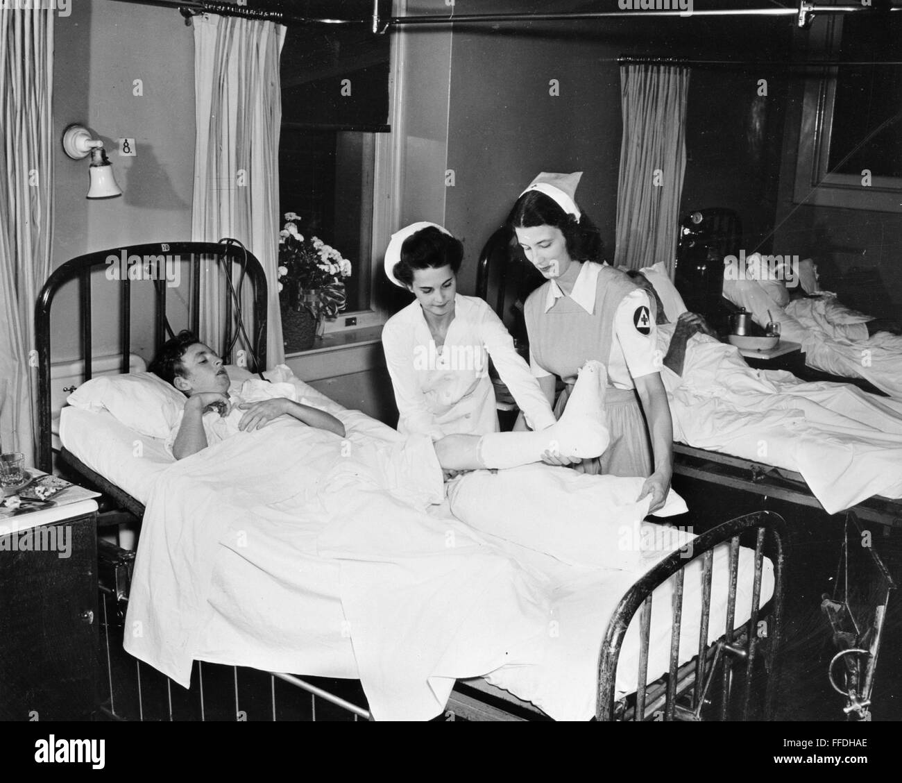 WW II: CIVILIAN HOSPITAL. /nRed Cross nurse's aids working in an ...