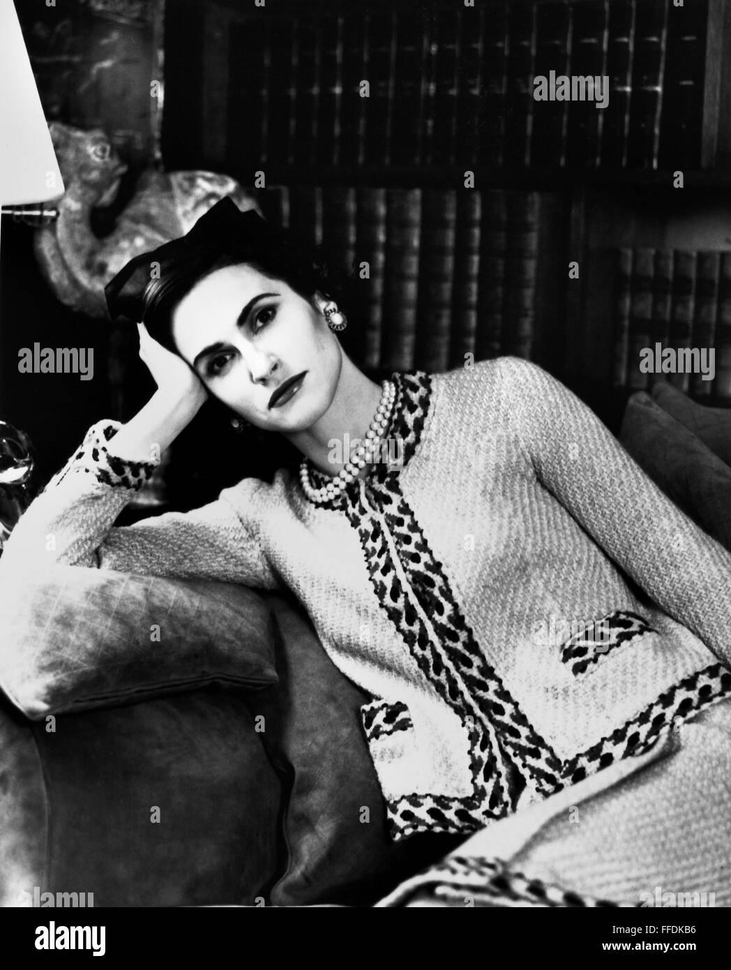WOMEN'S FASHION, 1960. /nModel wearing a tweed suit designed by ...