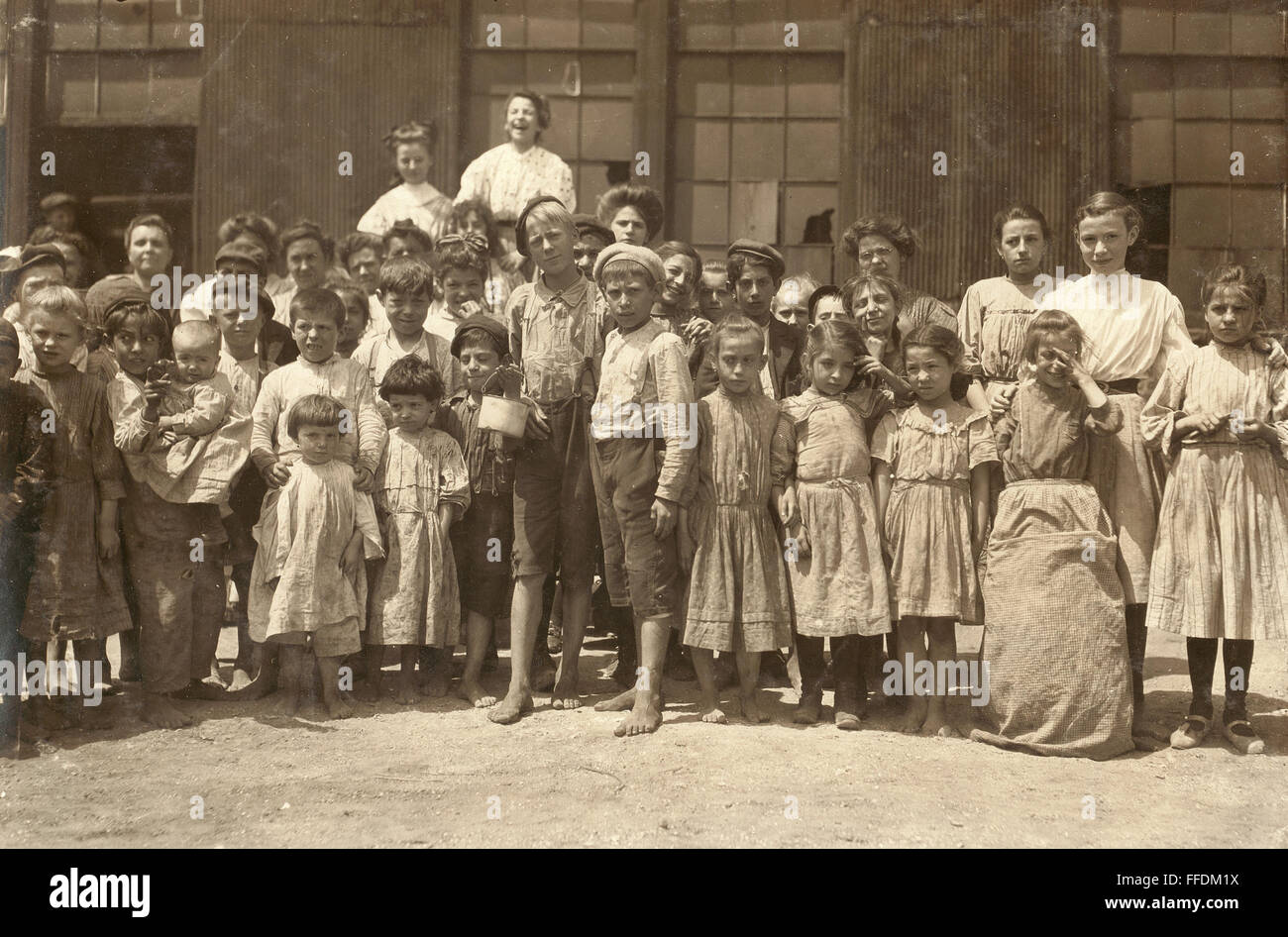 MARYLAND: FACTORY WORKERS. /nWorkers outside a packing company factory ...