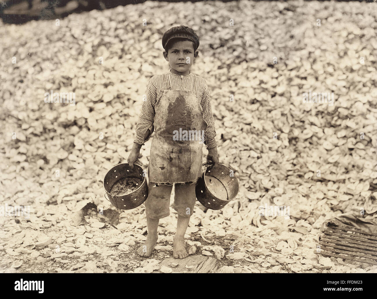 HINE: CHILD LABOR, 1911. /nA young shrimp-picker and oyster shucker in ...