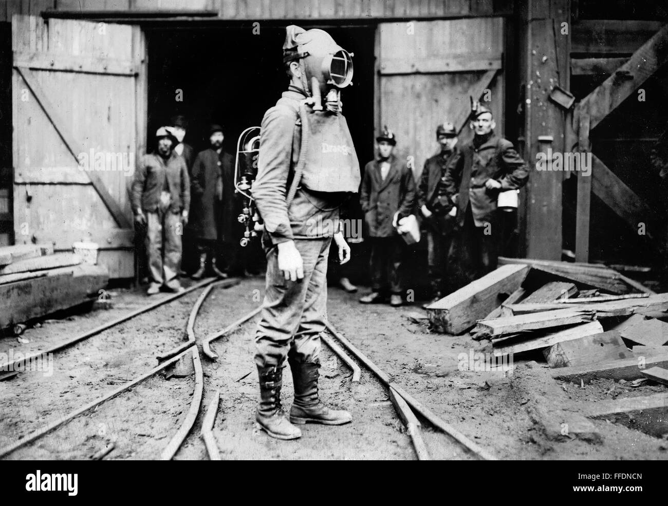 PENNSYLVANIA: COAL MINE. /n'First Aid to the Injured.' A man equipped ...