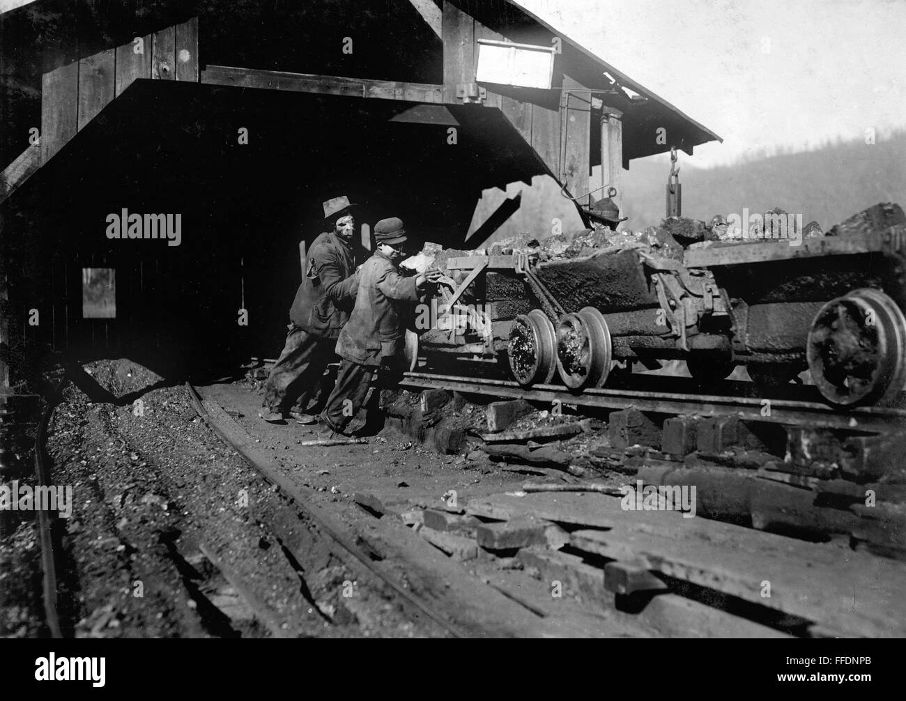 HINE: COAL MINER, 1910. /nA young coupling-boy about 12 to 13 years-old ...