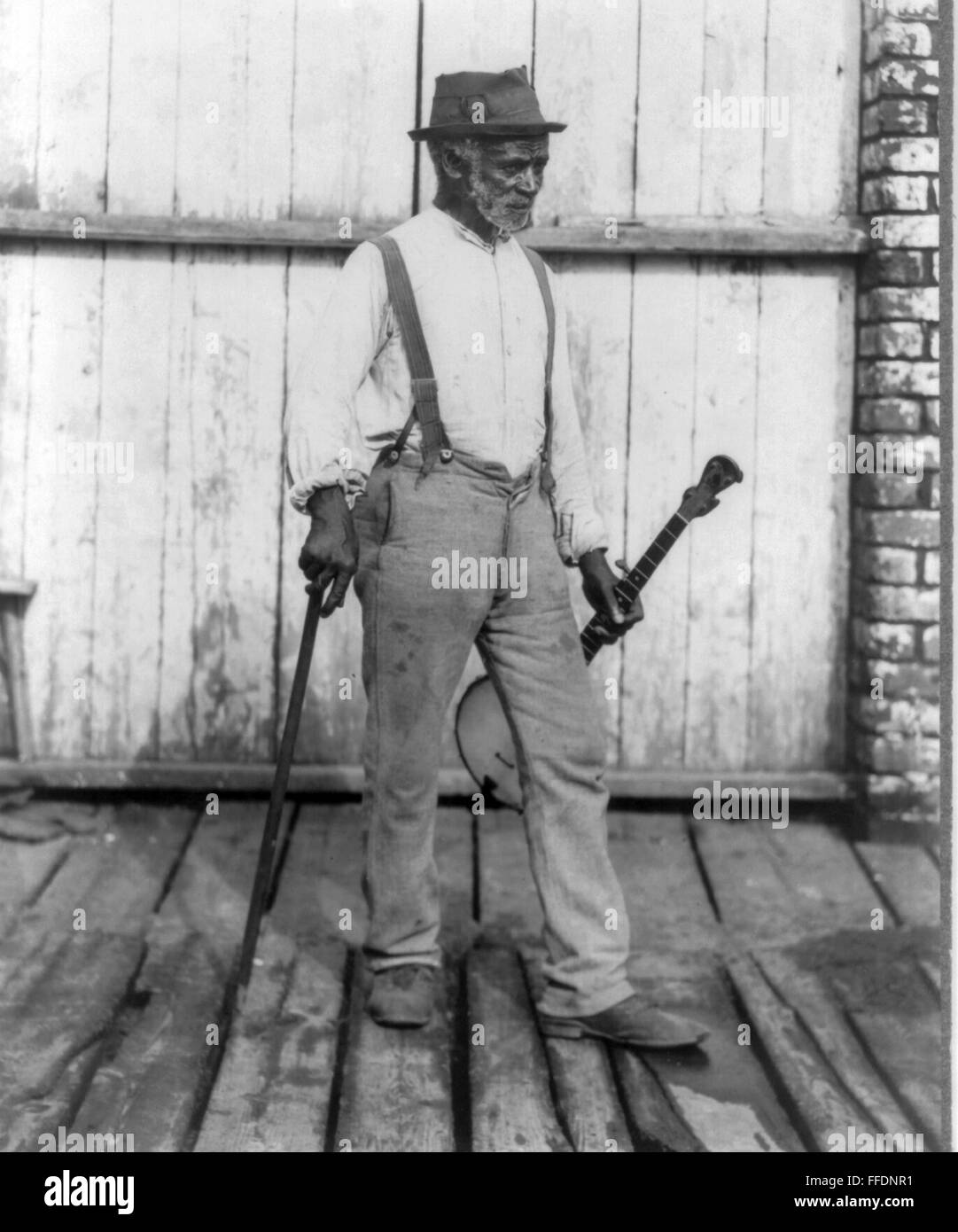 MINSTREL PERFORMER, c1905. /n'The Traveling Minstrel.' An African ...