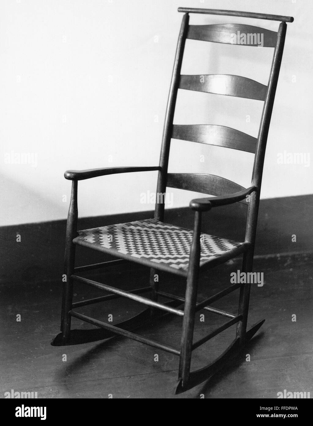 SHAKER ROCKING CHAIR, 1935. /nA maple Shaker rocking chair with a woven ...