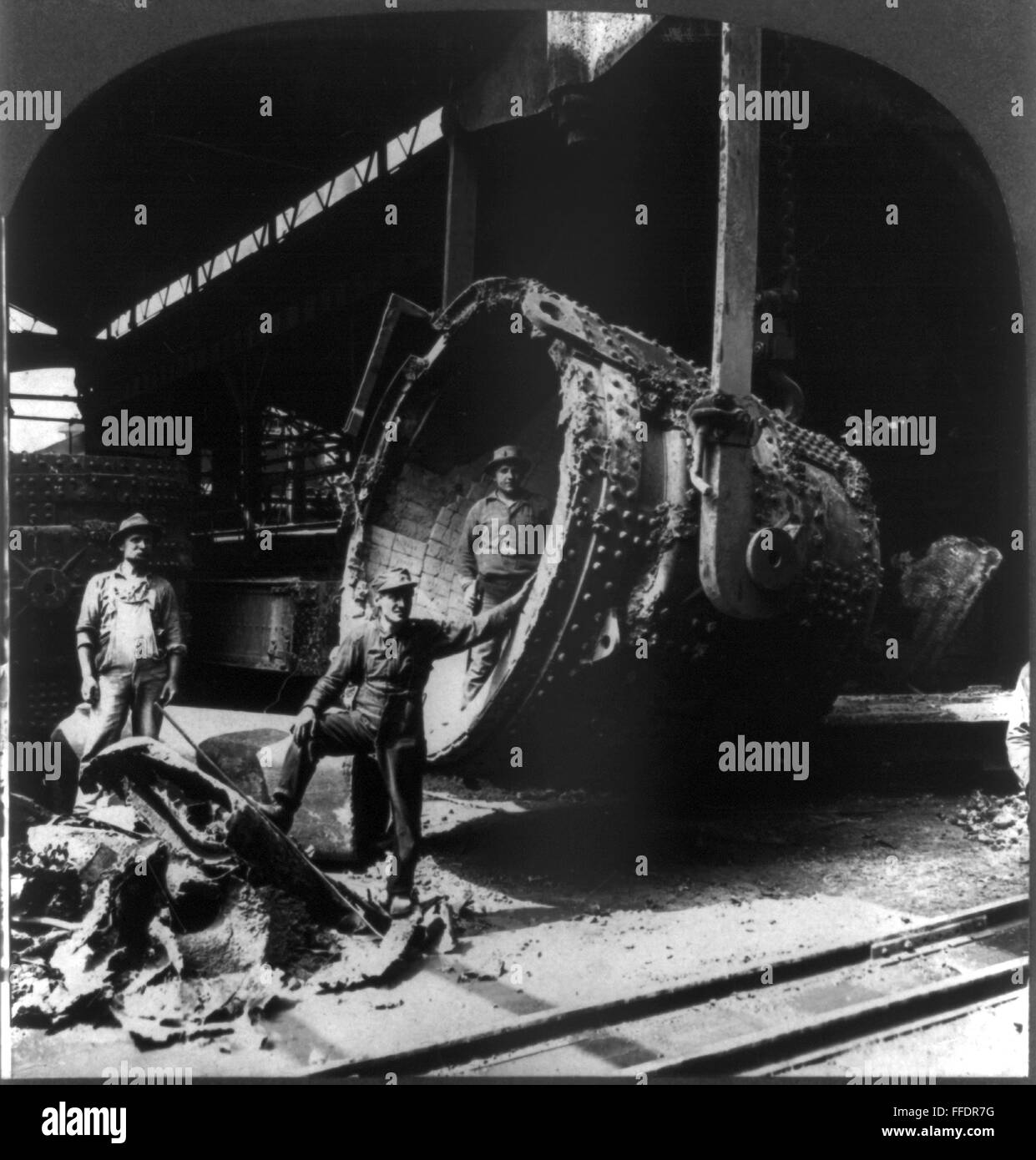 STEEL WORKERS, c1905. /nSteel workers cleaning and repairing a foundry ...