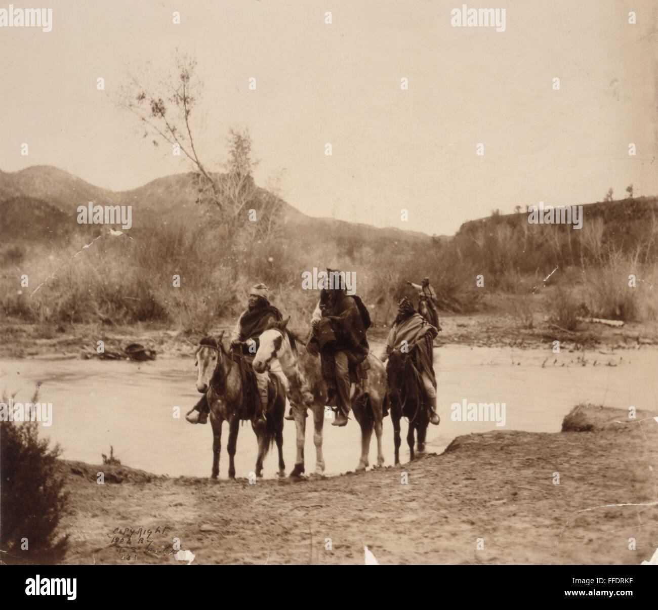 APACHE MEN, c1903. /n'At the ford.' Group of Apache men on horseback at ... APACHE MEN, c1903. /n'At the ford.' Group of Apache men on horseback at ...