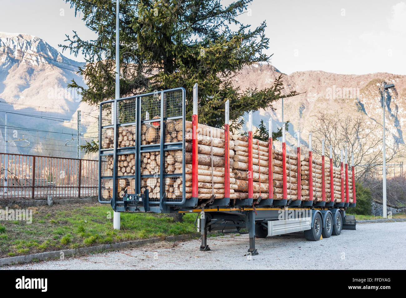 Forest industry. Trailer loaded with tree trunks Stock Photo - Alamy