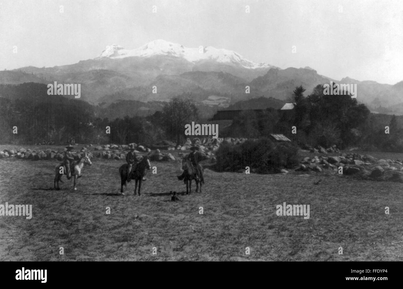 MEXICO: EXTINCT VOLCANO. /nMen on horseback stop near extinct volcano ...