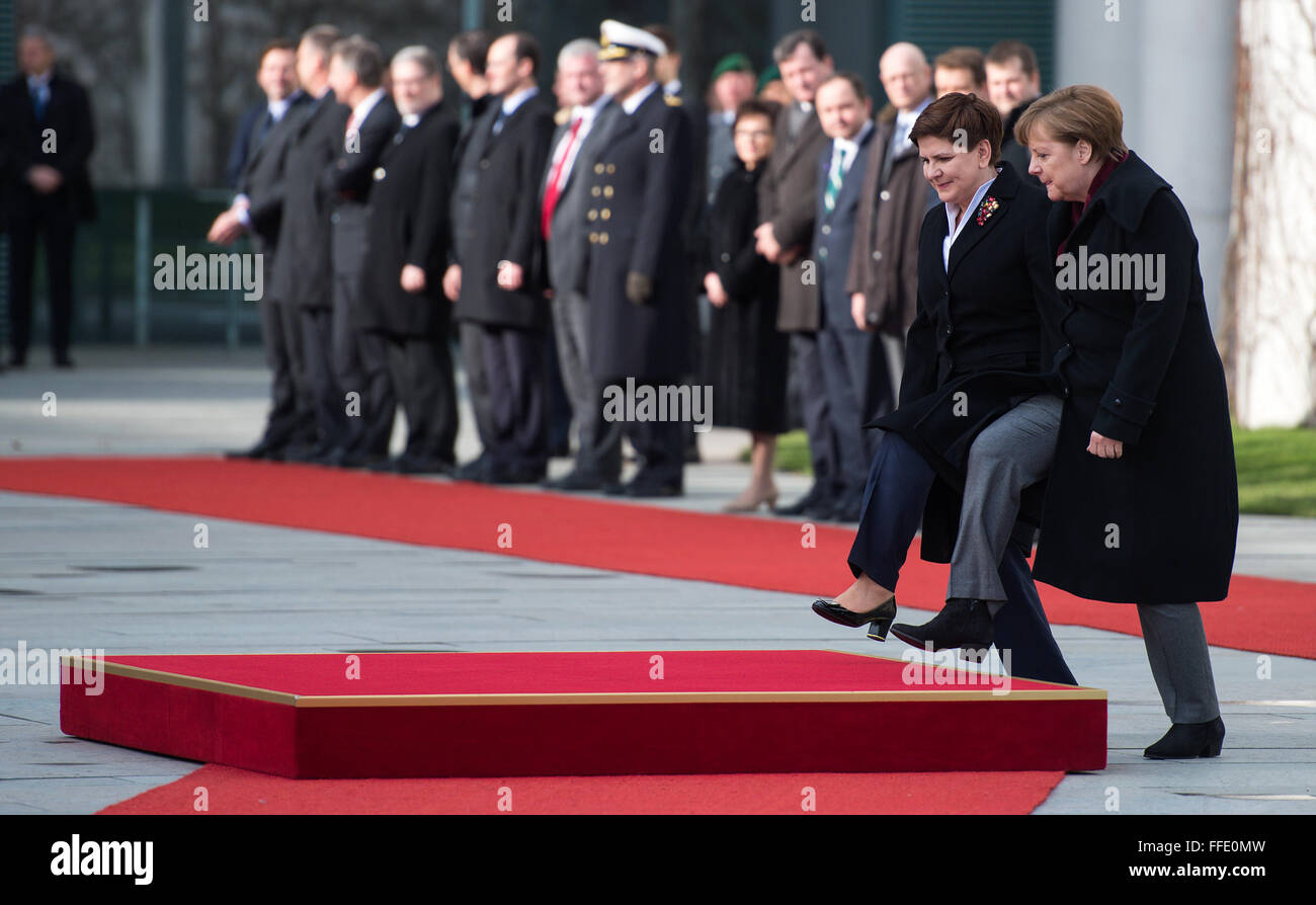 Berlin, Germany. 12th Feb, 2016. German Chancellor Angela Merkel (front ...