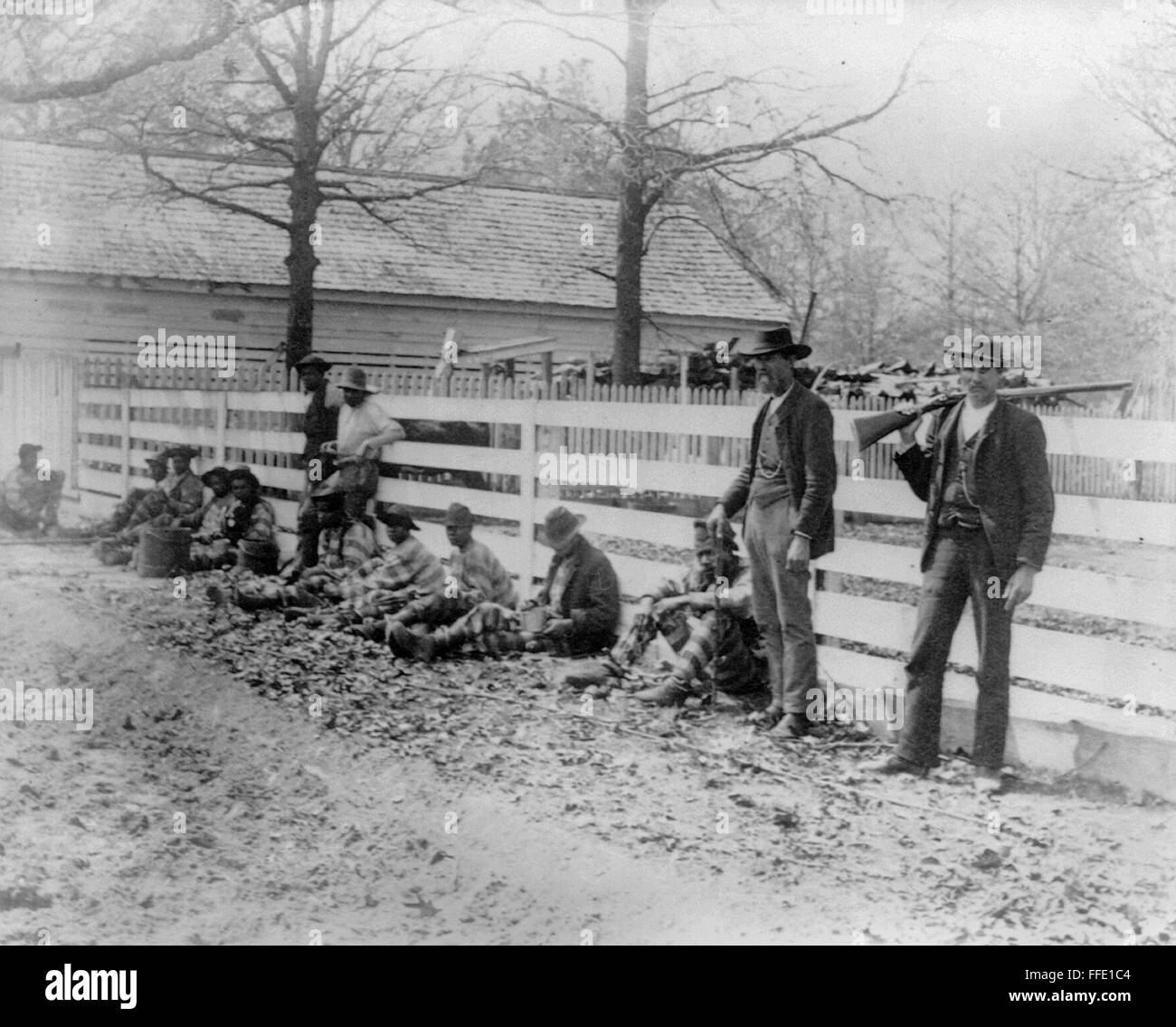 GEORGIA: CHAIN GANG. /nChain gang prisoners and guards rest against a ...