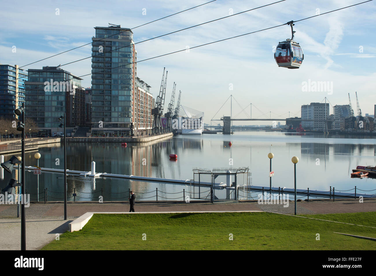 Emirates Air Line cable cars running across The Royal Victoria Dock ...