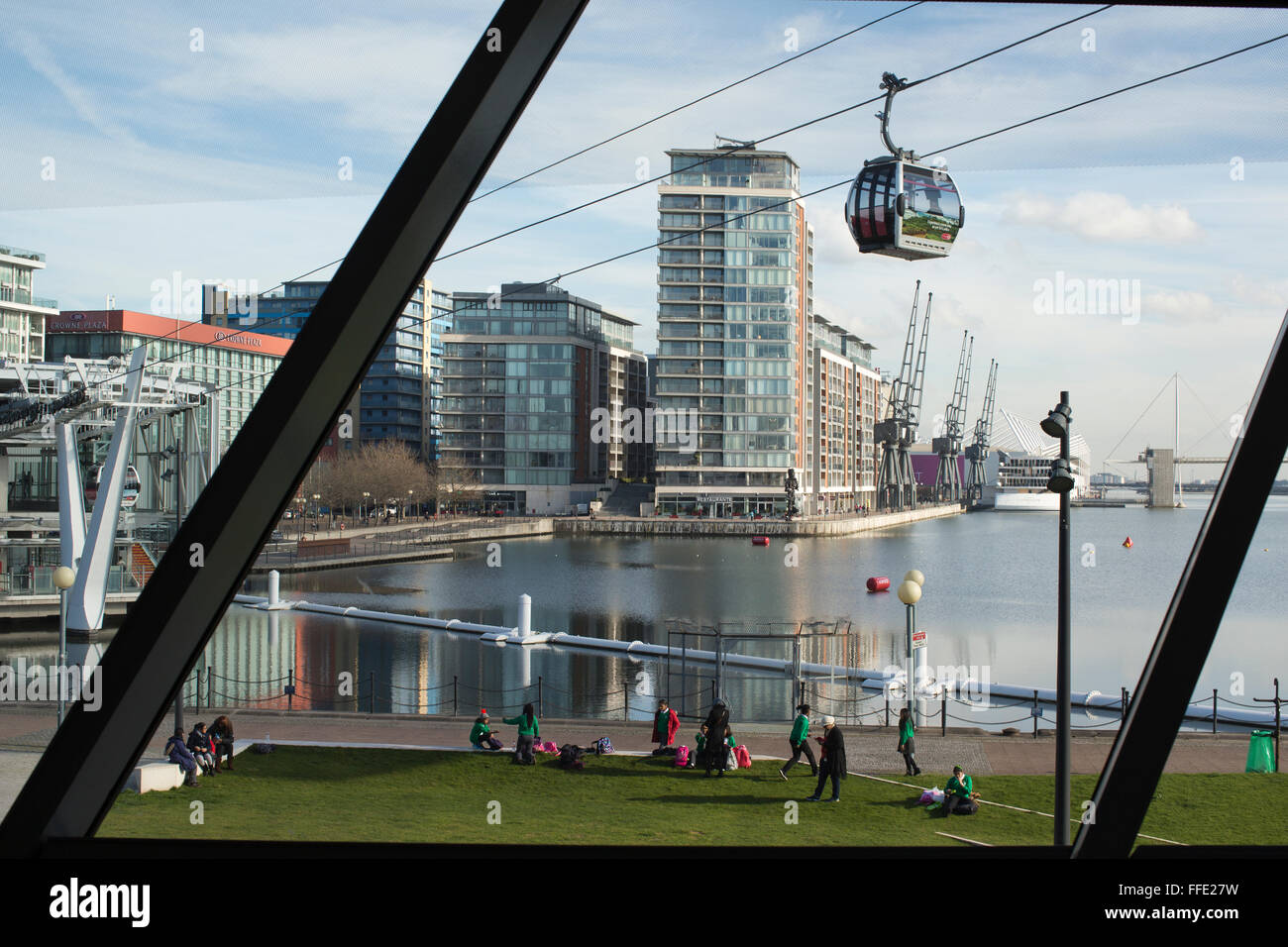 Emirates Air Line cable cars running across The Royal Victoria Dock ...