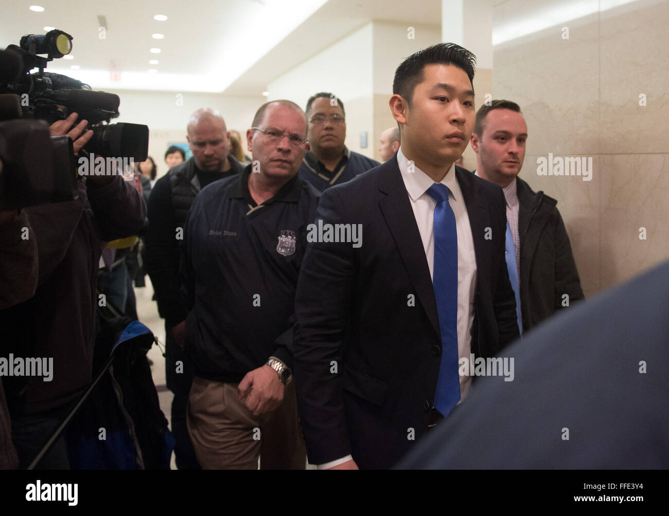 New York, NY, USA. 11th Feb, 2016. NYPD officer Peter Liang enters the ...