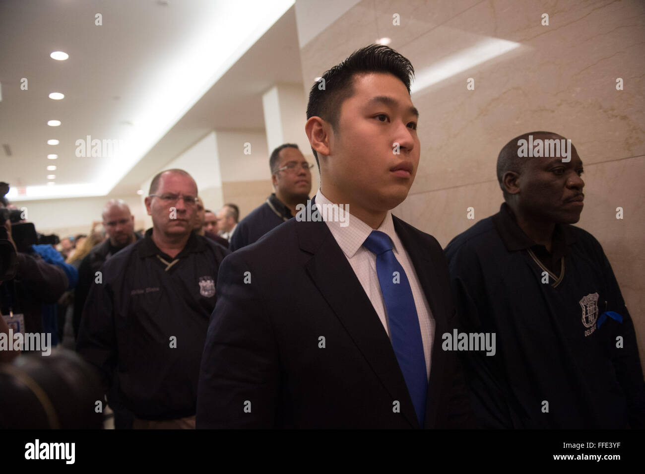 New York, NY, USA. 11th Feb, 2016. NYPD officer PETER LIANG enters the ...