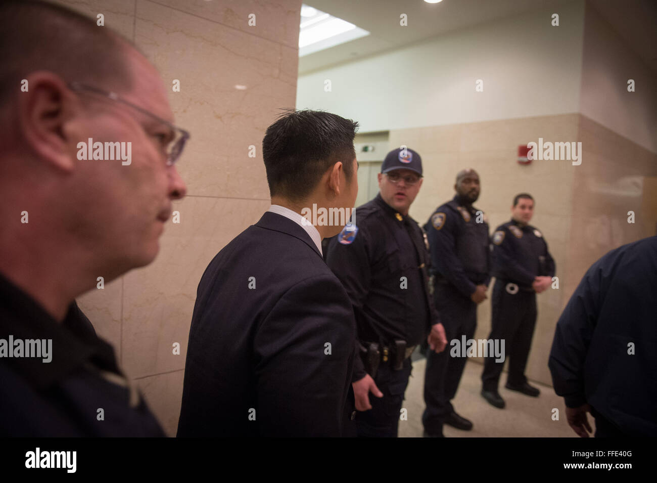 New York, NY, USA. 11th Feb, 2016. NYPD officer Peter Liang enters the ...