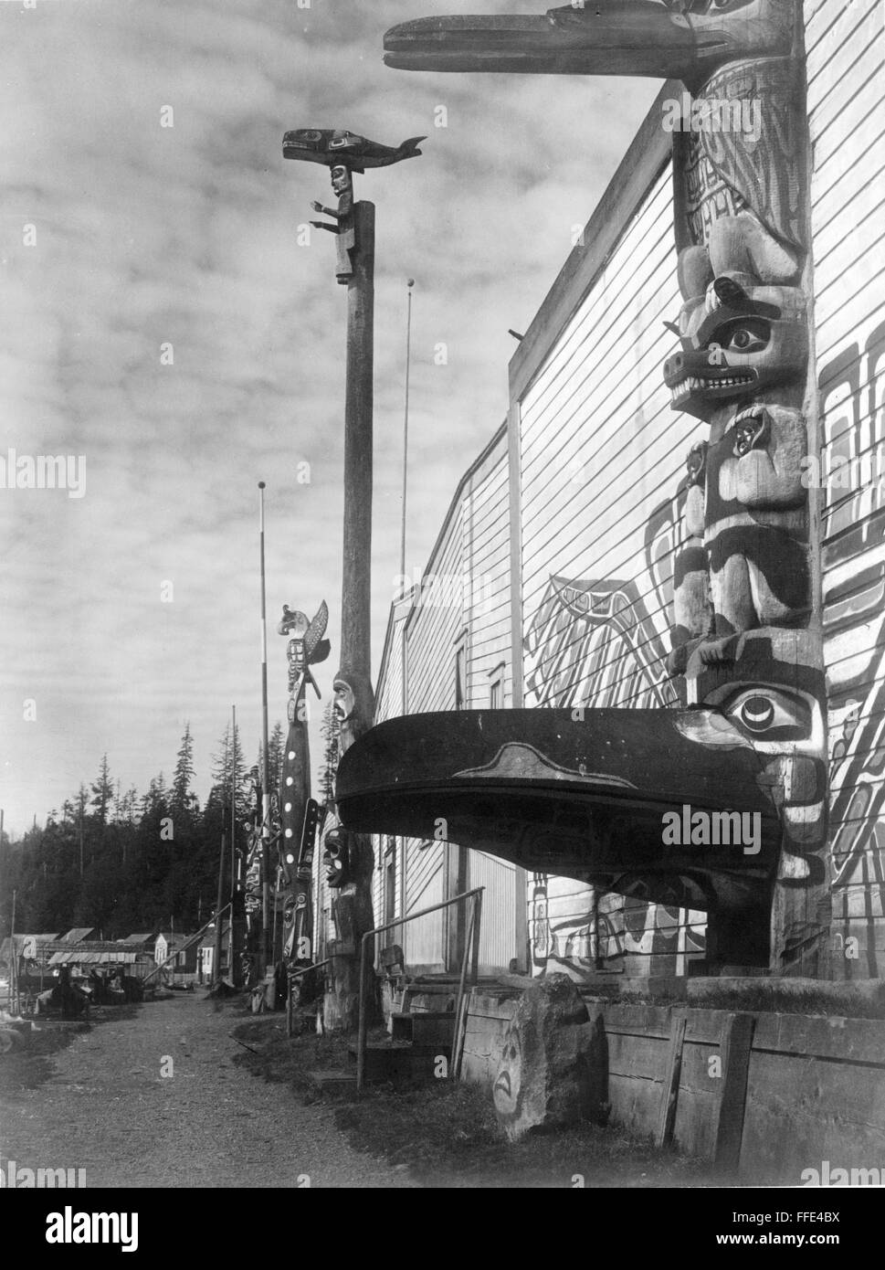 KWAKIUTL VILLAGE, c1914. /nA Kwakiutl village with totem poles at Alert ...