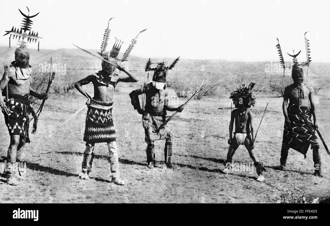 APACHE DANCE, 1889. /nFour costumed Apache men performing a mountain ...
