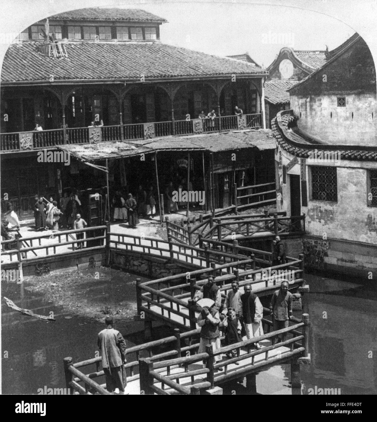 CHINA: SHANGHAI, 1900. /nA typical footbridge and buildings in Shanghai ...