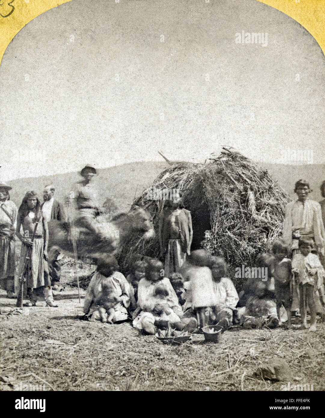 APACHE CAMP, c1873. /nGroup of Coyotero Apaches outside their wickiups ...