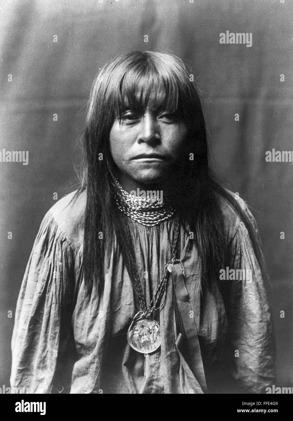 APACHE MAN, c1906. /nYuls-Huls-Walking, an Apache man, wearing several ...