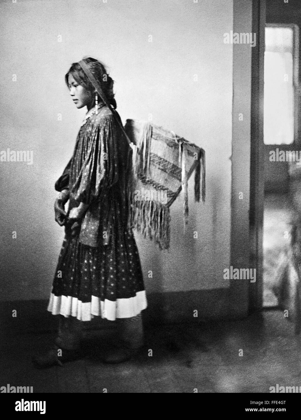 APACHE WOMAN, c1902. /nA young Apache woman carrying a basket ...
