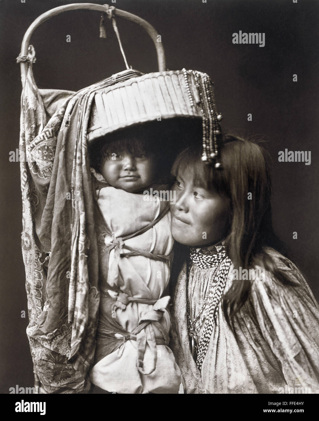 APACHE WOMAN & CHILD, c1903. /nAn Apache woman with an infant in a ...