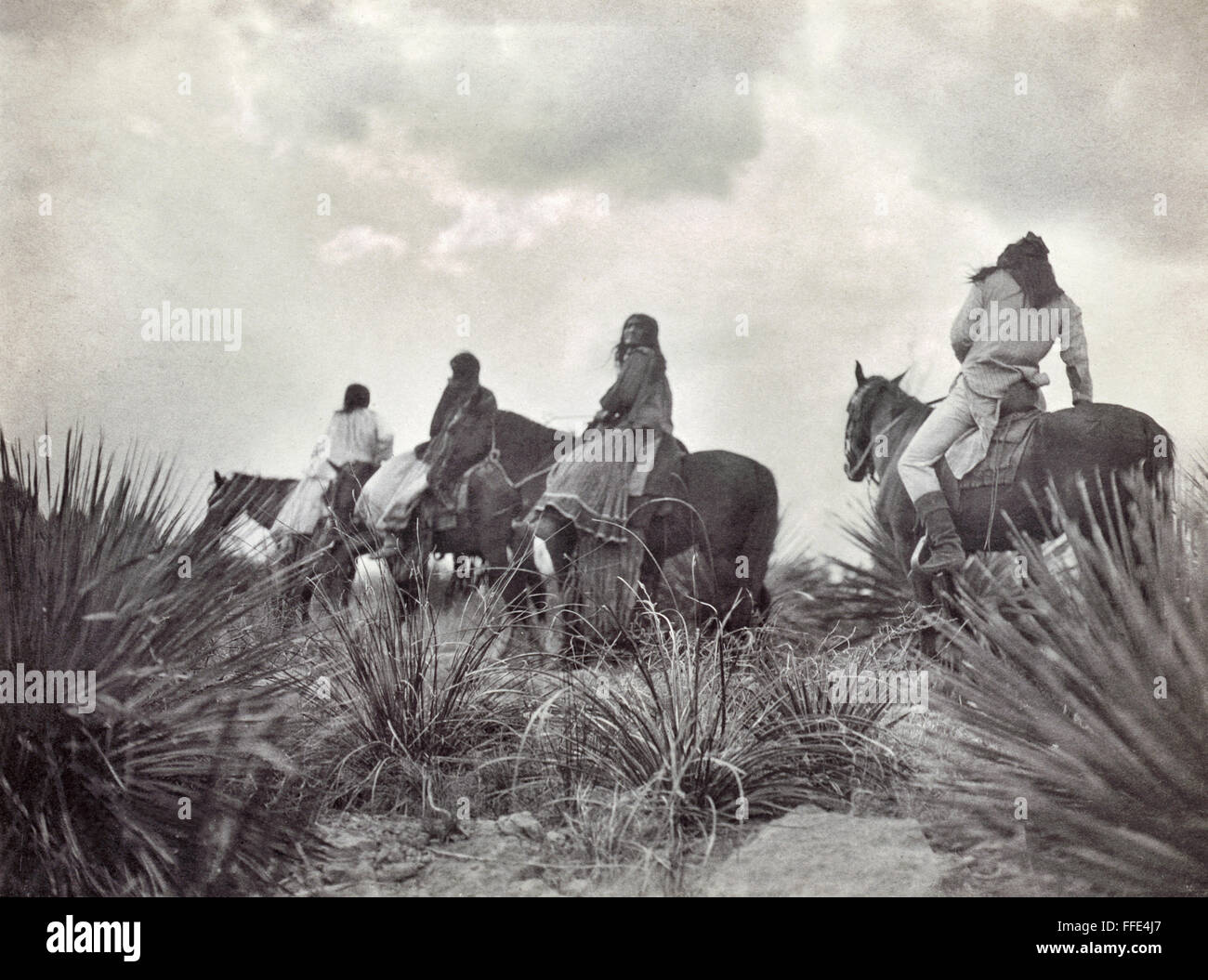 APACHE ON HORSEBACK, c1906. /n'Before the storm.' A group of Apache men ...