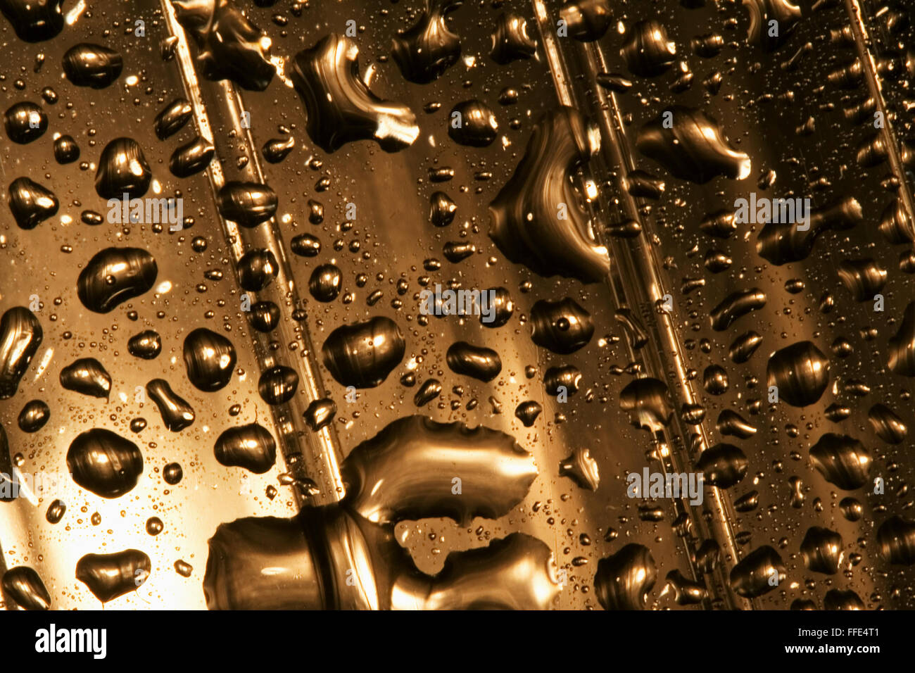abstract gold drop in a plastic material Stock Photo - Alamy