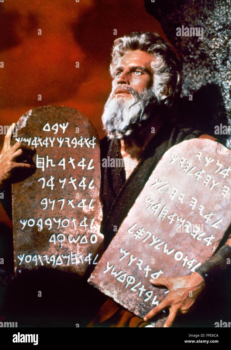 TEN COMMANDMENTS, 1956. /nCharlton Heston as Moses on a poster for the ...