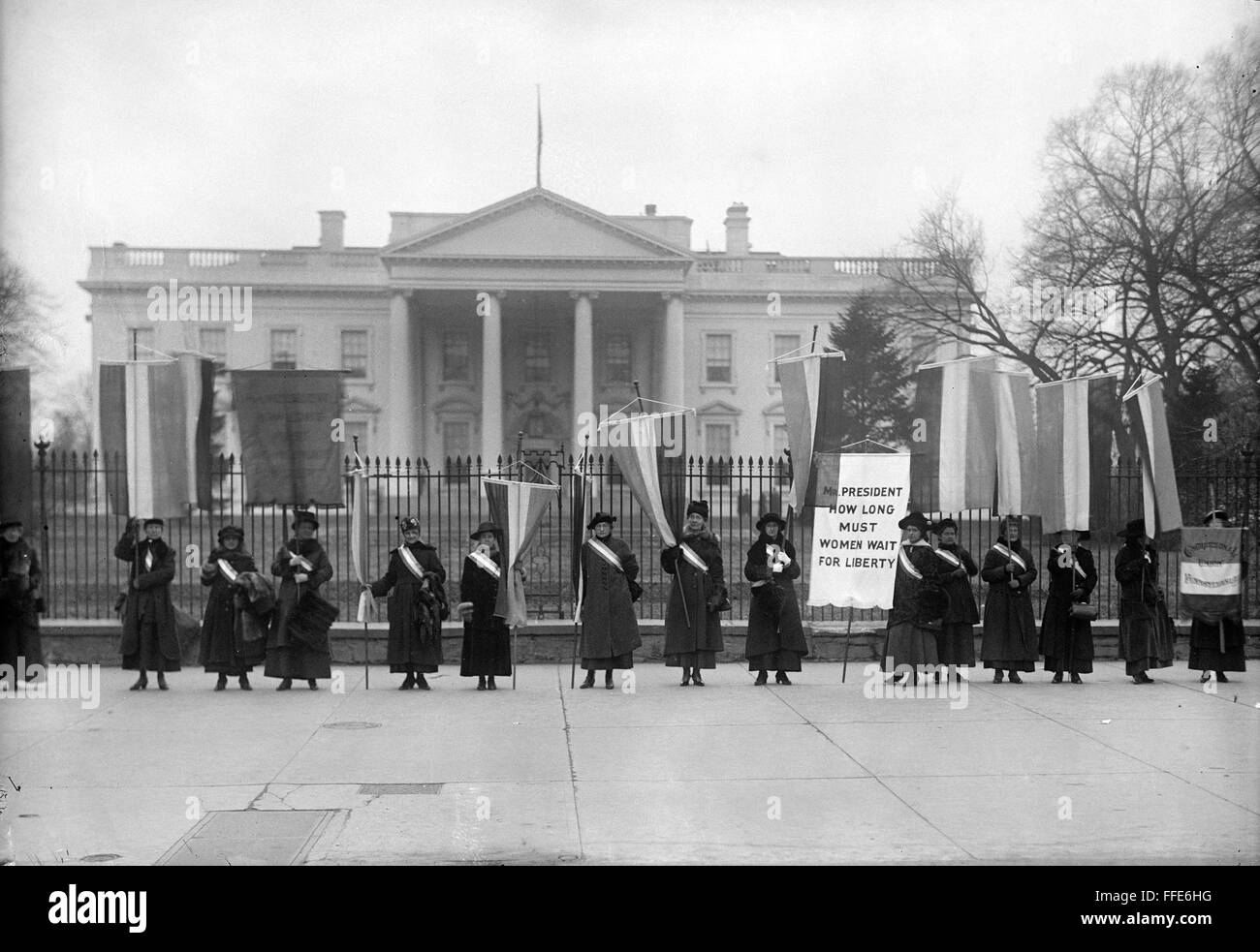WHITE HOUSE: SUFFRAGETTES. /nWomen suffragettes picketing in front of ...