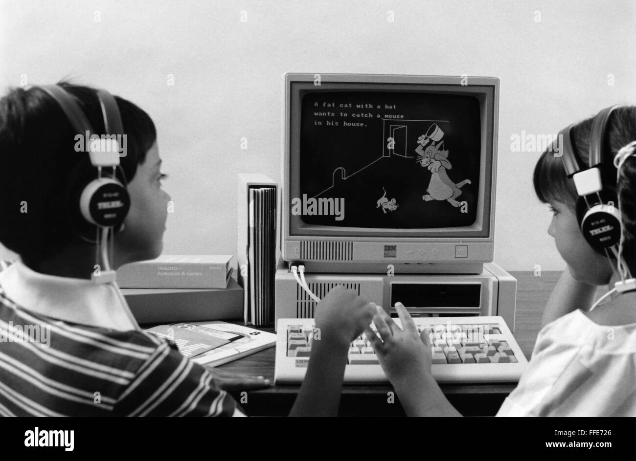 EDUCATION: COMPUTERS, 1983. /nAmerican children learning to read with ...