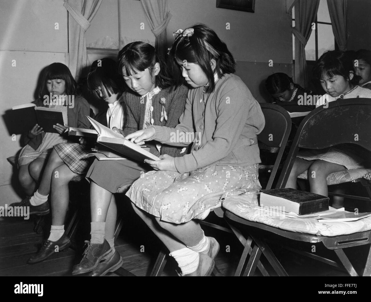 JAPANESE INTERNMENT, 1943. /nChildren studying at Sunday school at the ...