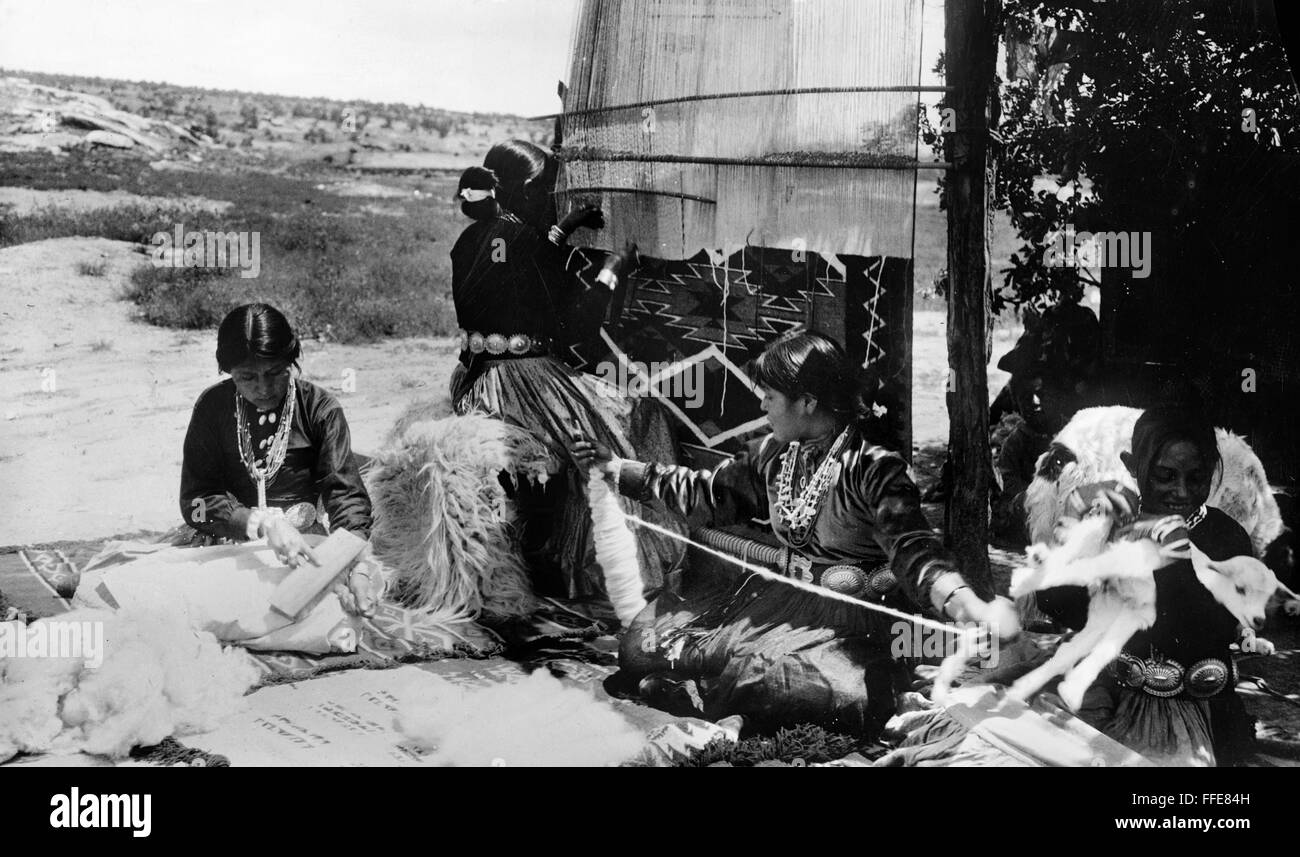 NAVAJO WOMEN WEAVING. /nThree Navajo women combing wool, spinning ...
