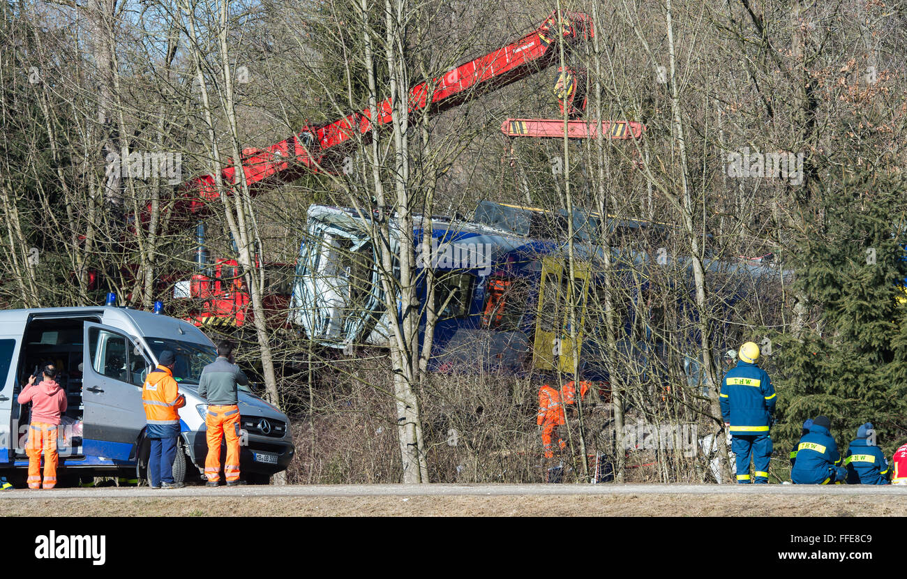 Bad Aibling, Germany. 12th Feb, 2016. People clear the crash site in ...